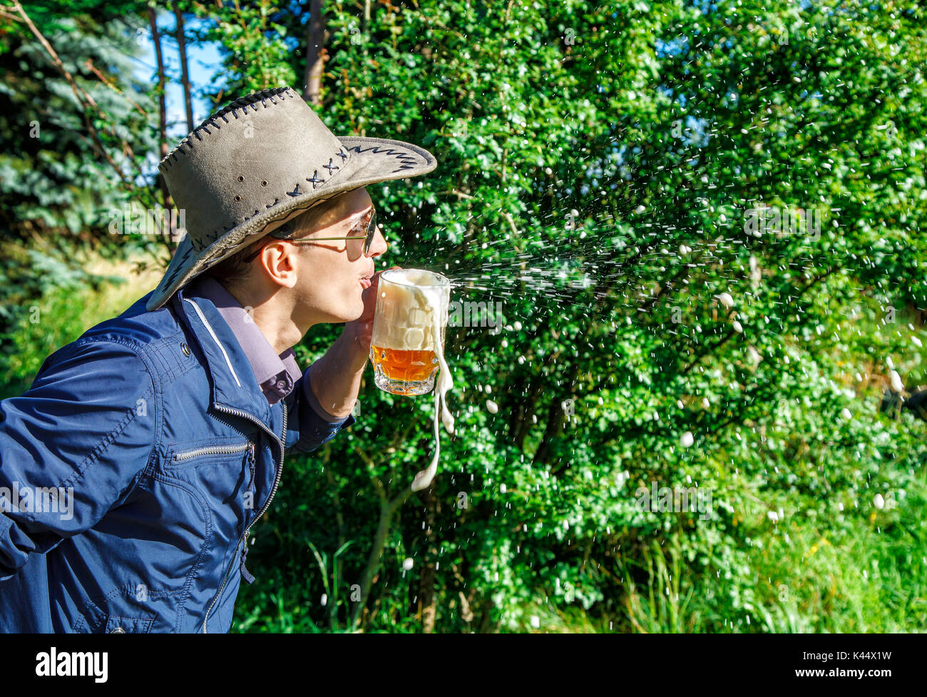 Cowboy drinking beer hi-res stock photography and images - Alamy