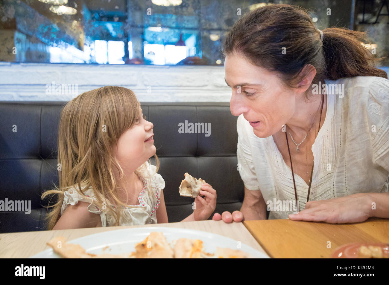 Mum talking child black hi-res stock photography and images - Alamy