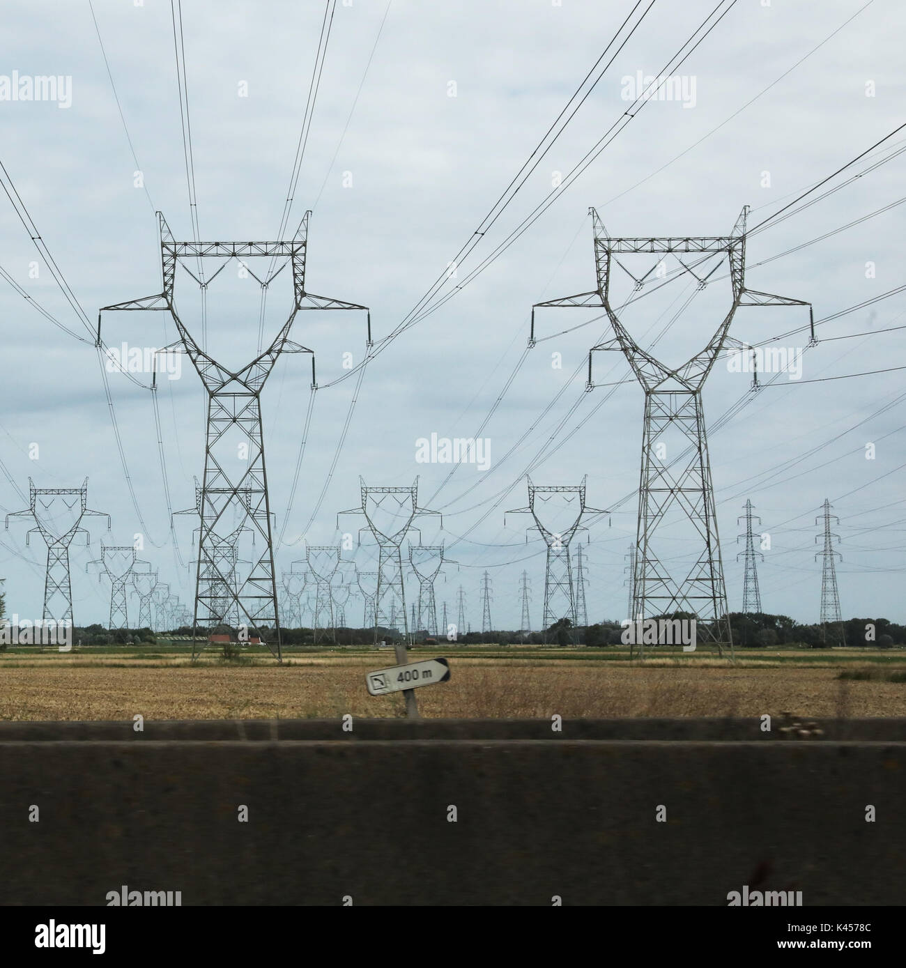 High Voltage Electricity Pylons E40 France Europe Stock Photo - Alamy