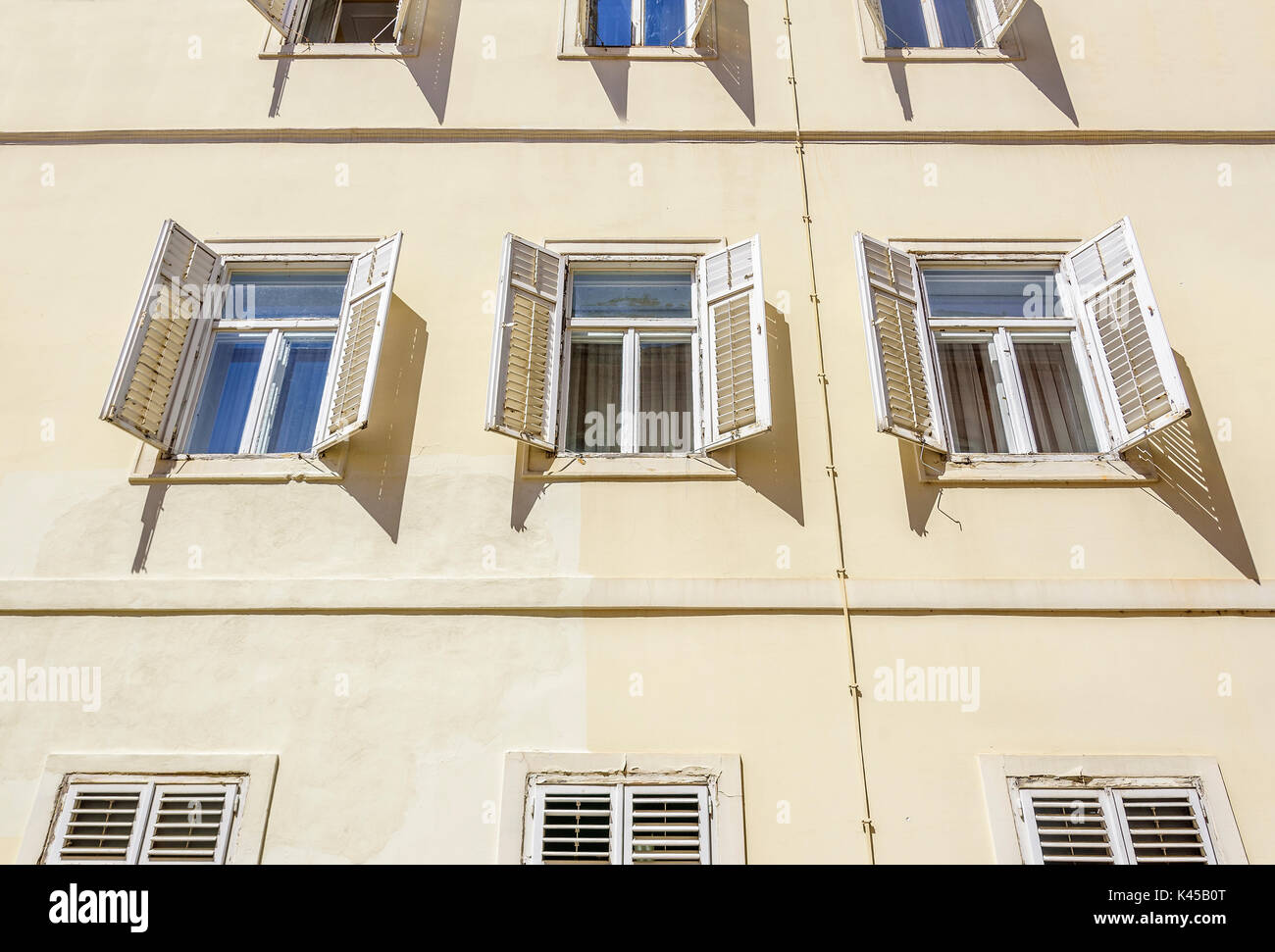 Vintage building facade wall with windows. European architecture Stock ...