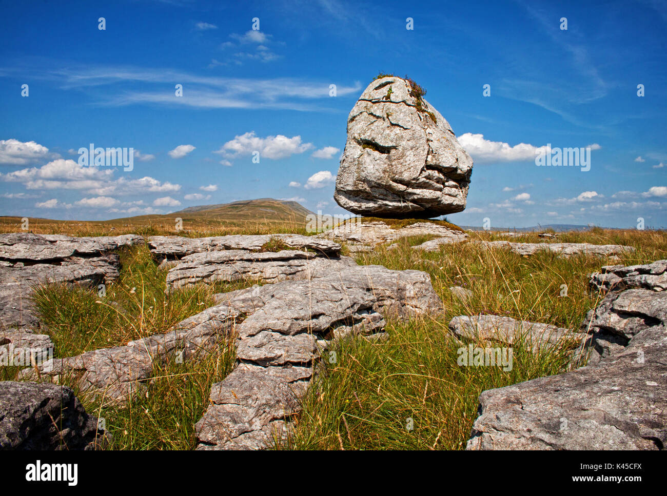 The big rock. An erratic high on the surrounding limestone pavement ...
