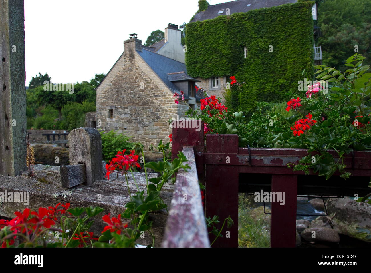 Geraniums on a balcony Pont Aven Brittany France Stock Photo - Alamy