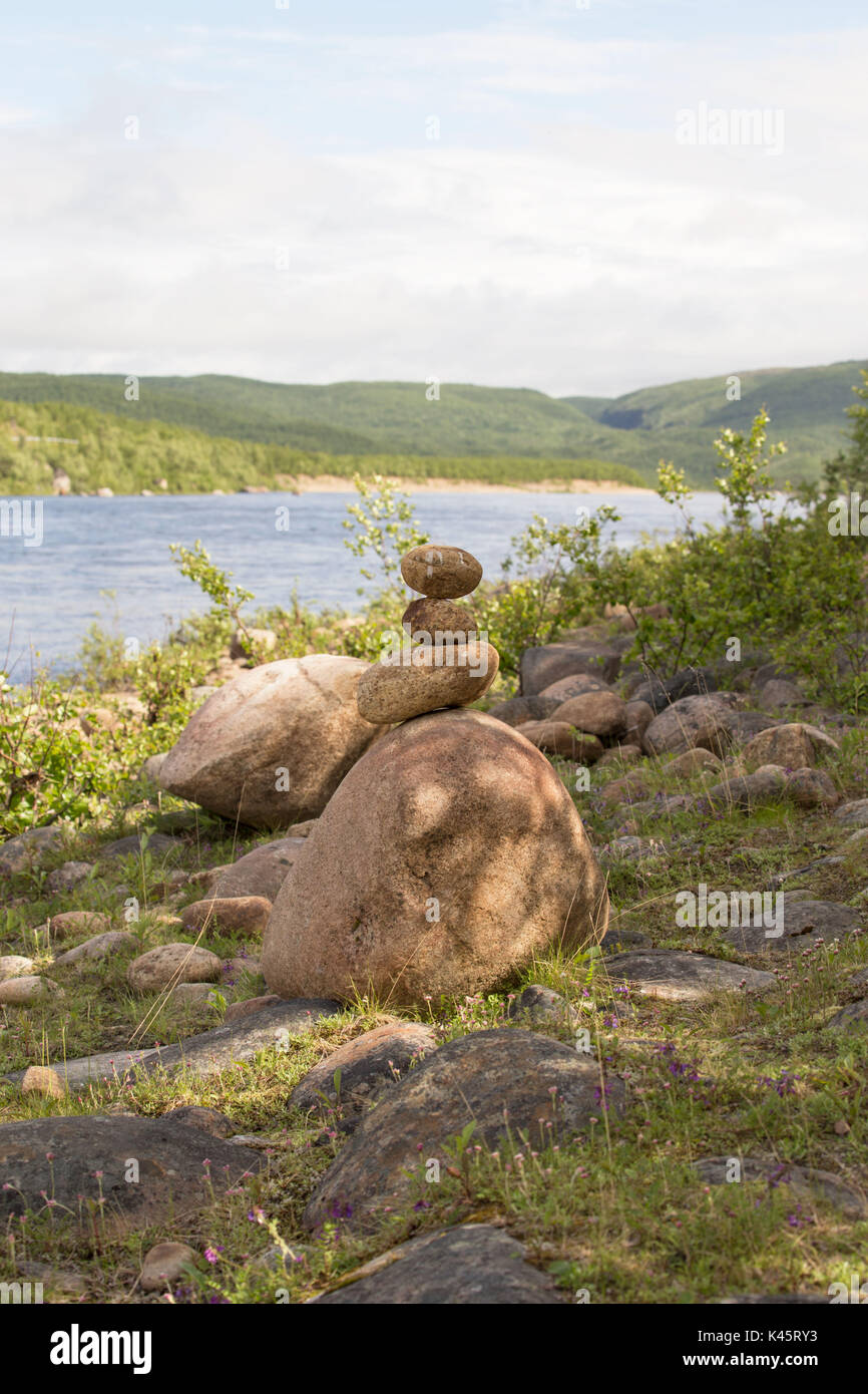Rock tower of stacking rocks by the Tana river, Lapland Stock Photo - Alamy