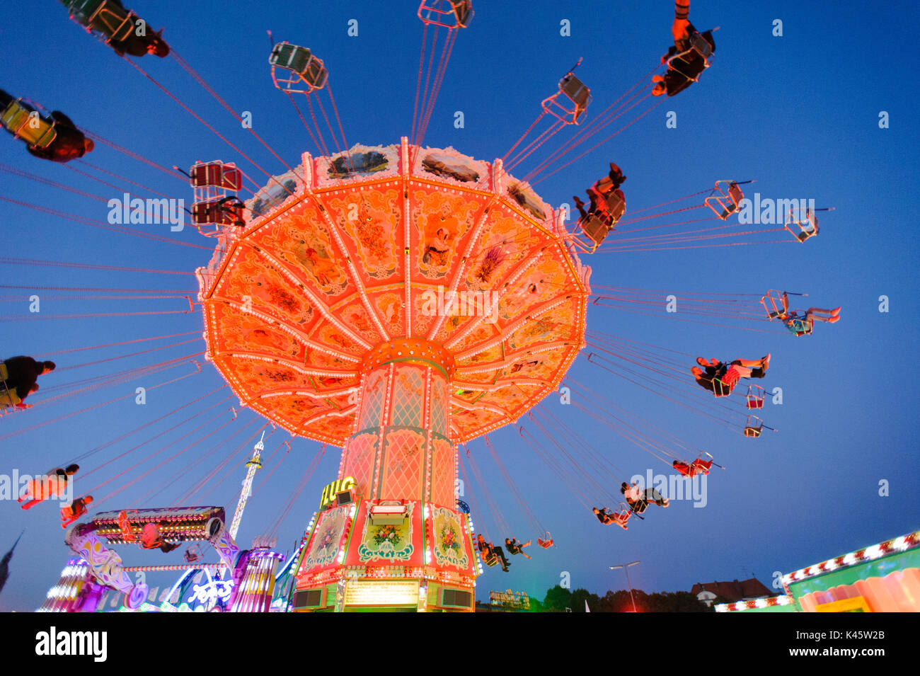 Flying swing at oktoberfest hi-res stock photography and images - Alamy