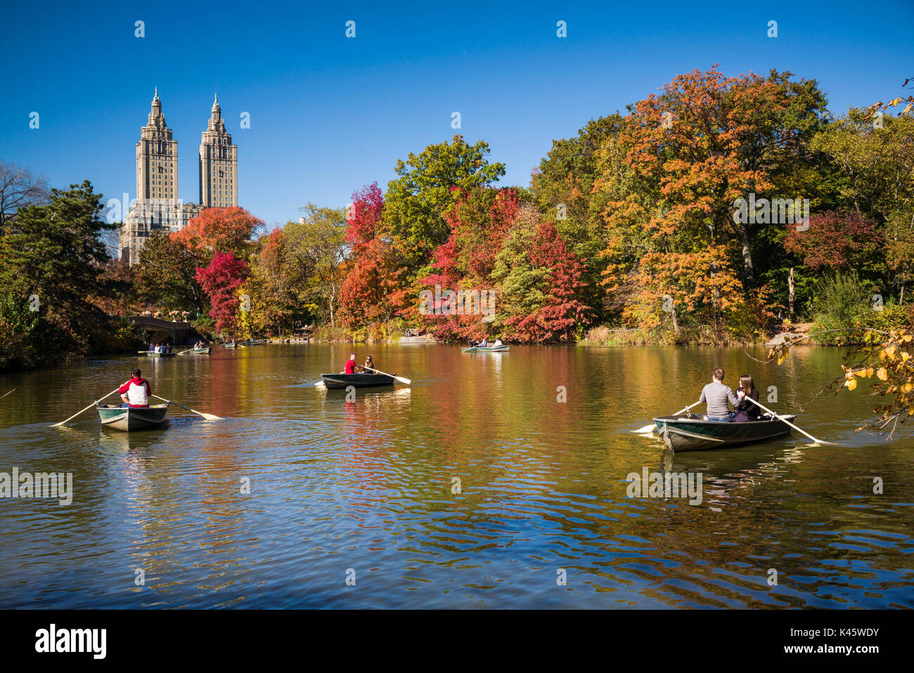 USA, New York, New York City, Central Park, rowing on The Lake, autumn ...
