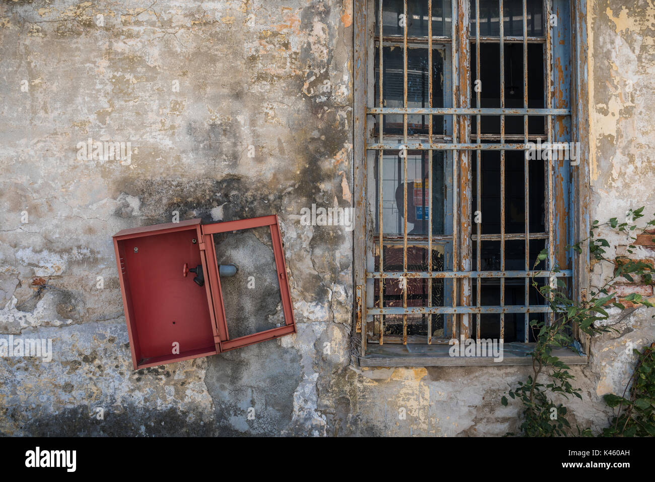 Abandoned building with empty fire hydrant box Stock Photo - Alamy