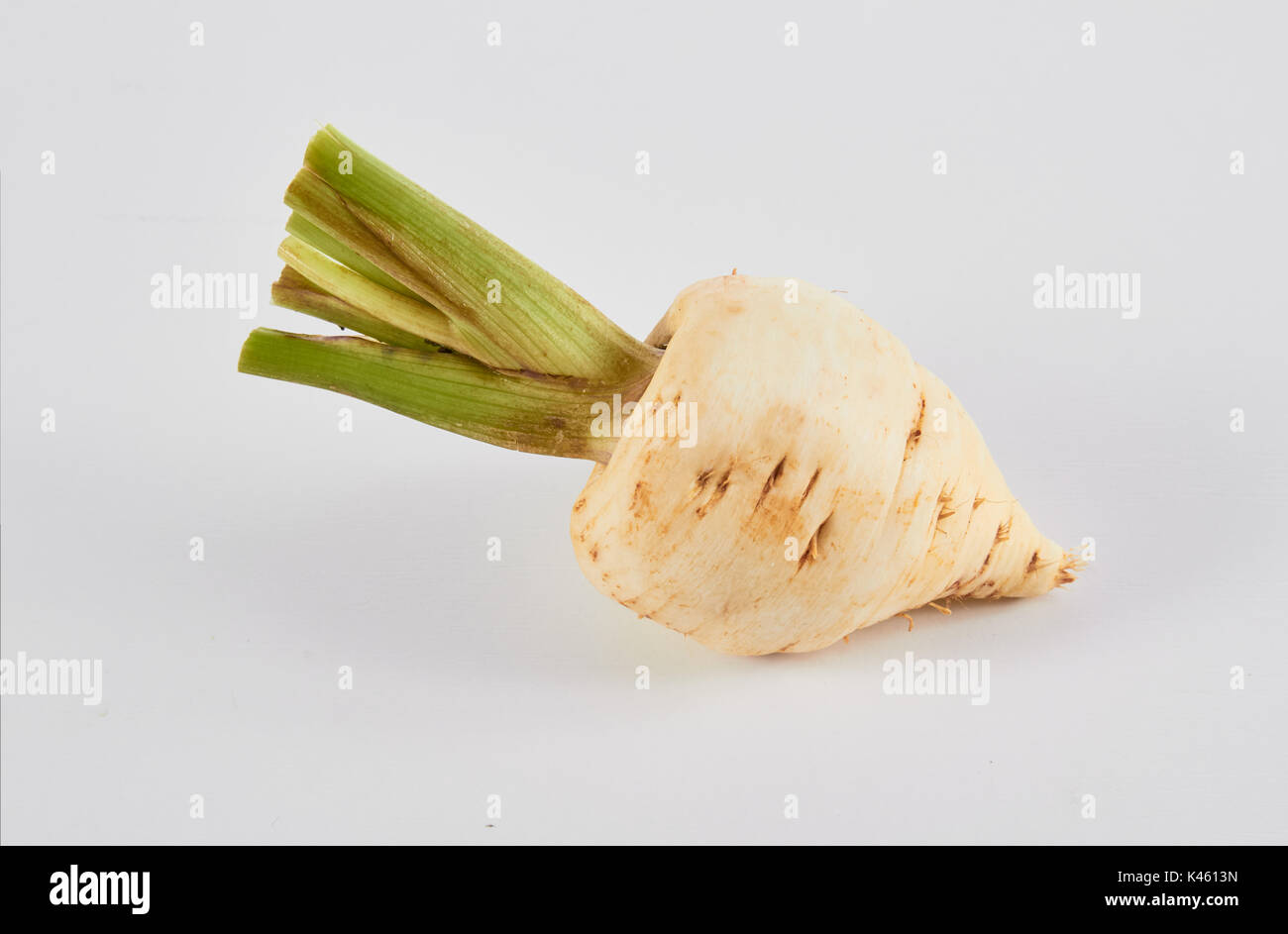 fresh parsnip on white background Stock Photo - Alamy