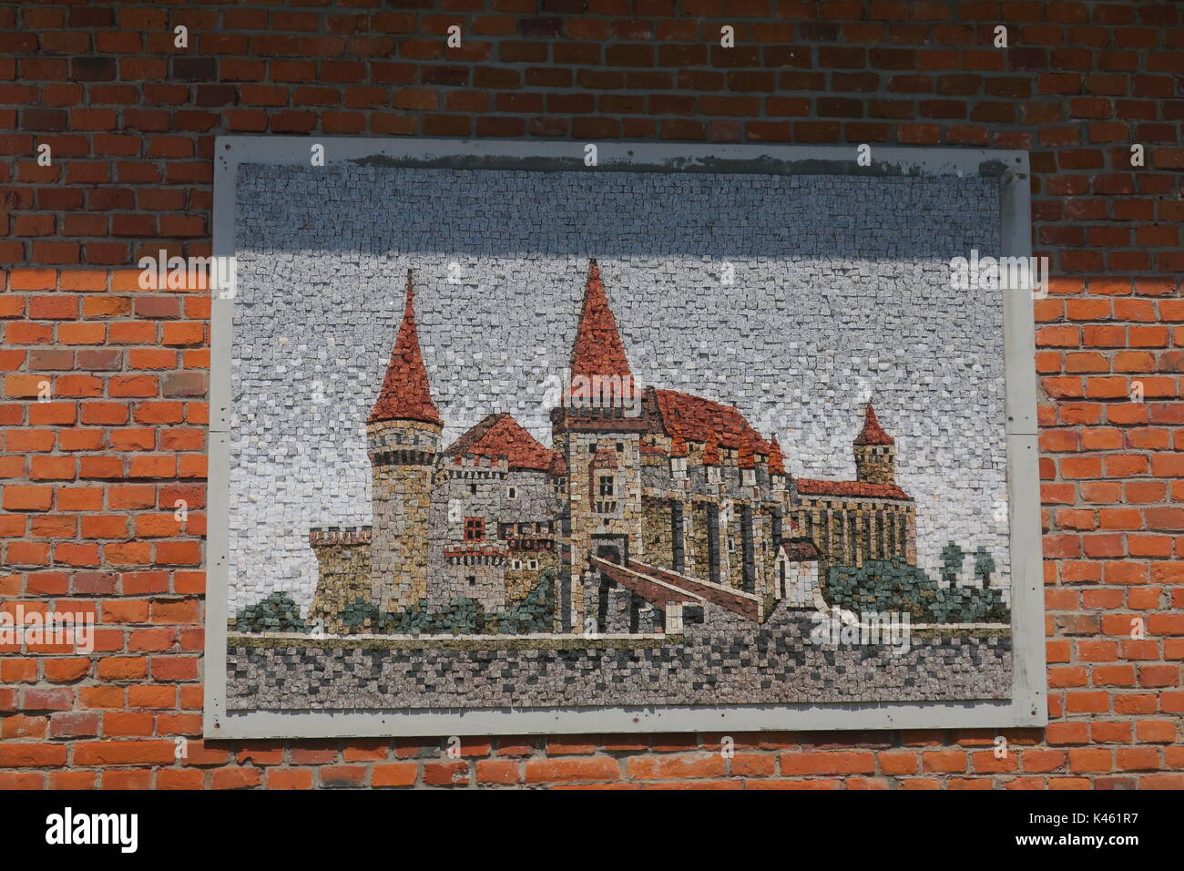Image made from stone blocks, showing the Corvin Castle in Hunedoara ...