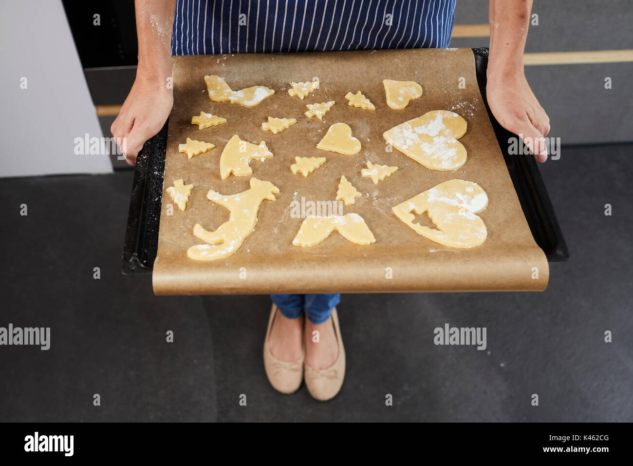 Woman baking biscuits hi-res stock photography and images - Alamy