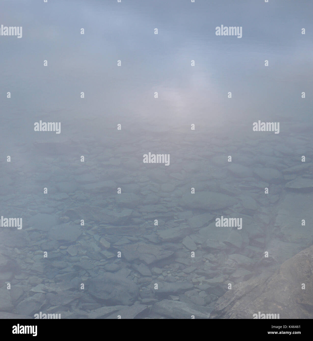 Rocks seen through water Stock Photo - Alamy