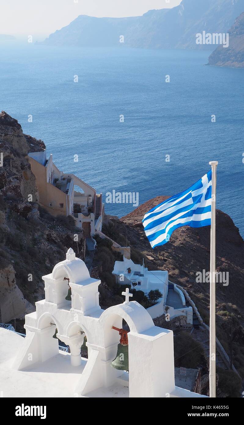 Santorini icons in Oia, Greece including the Greek Flag overlooking the ...