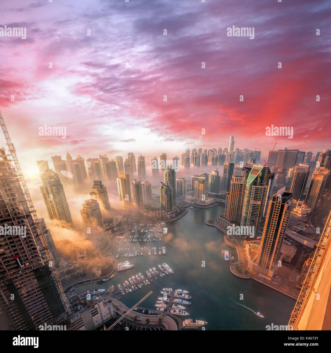Dubai Marina with colorful sunset in Dubai, United Arab Emirates Stock ...