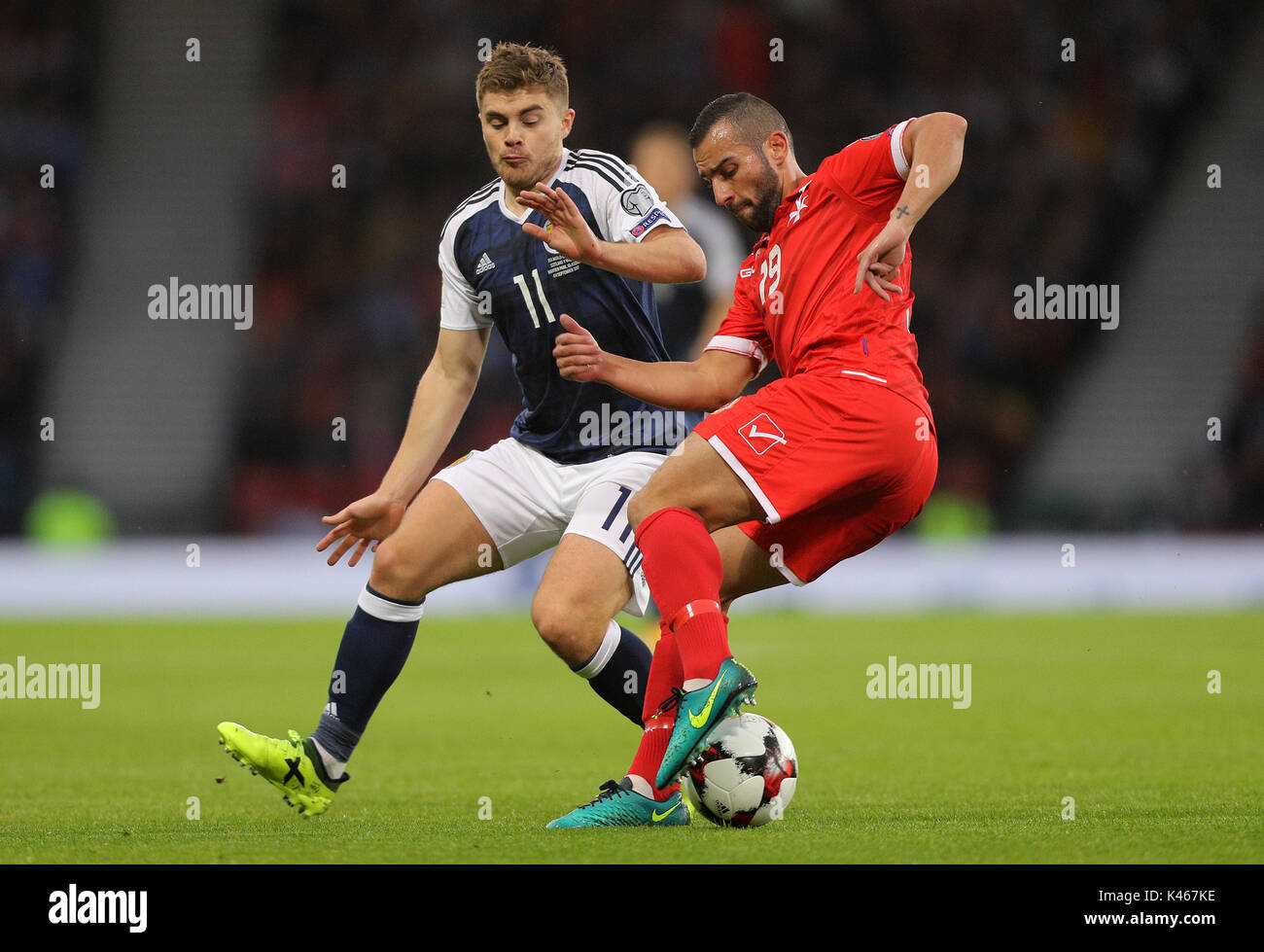 Scotland's James Forrest (left) and Malta's Joe Zerafa in action during ...