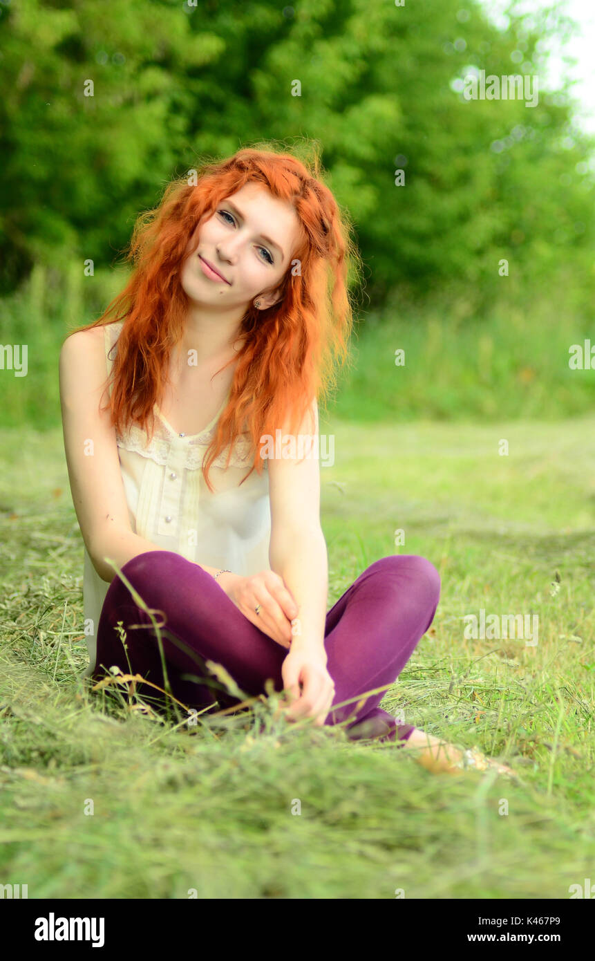 A young beautiful ore girl of the Caucasian appearance is having fun ...