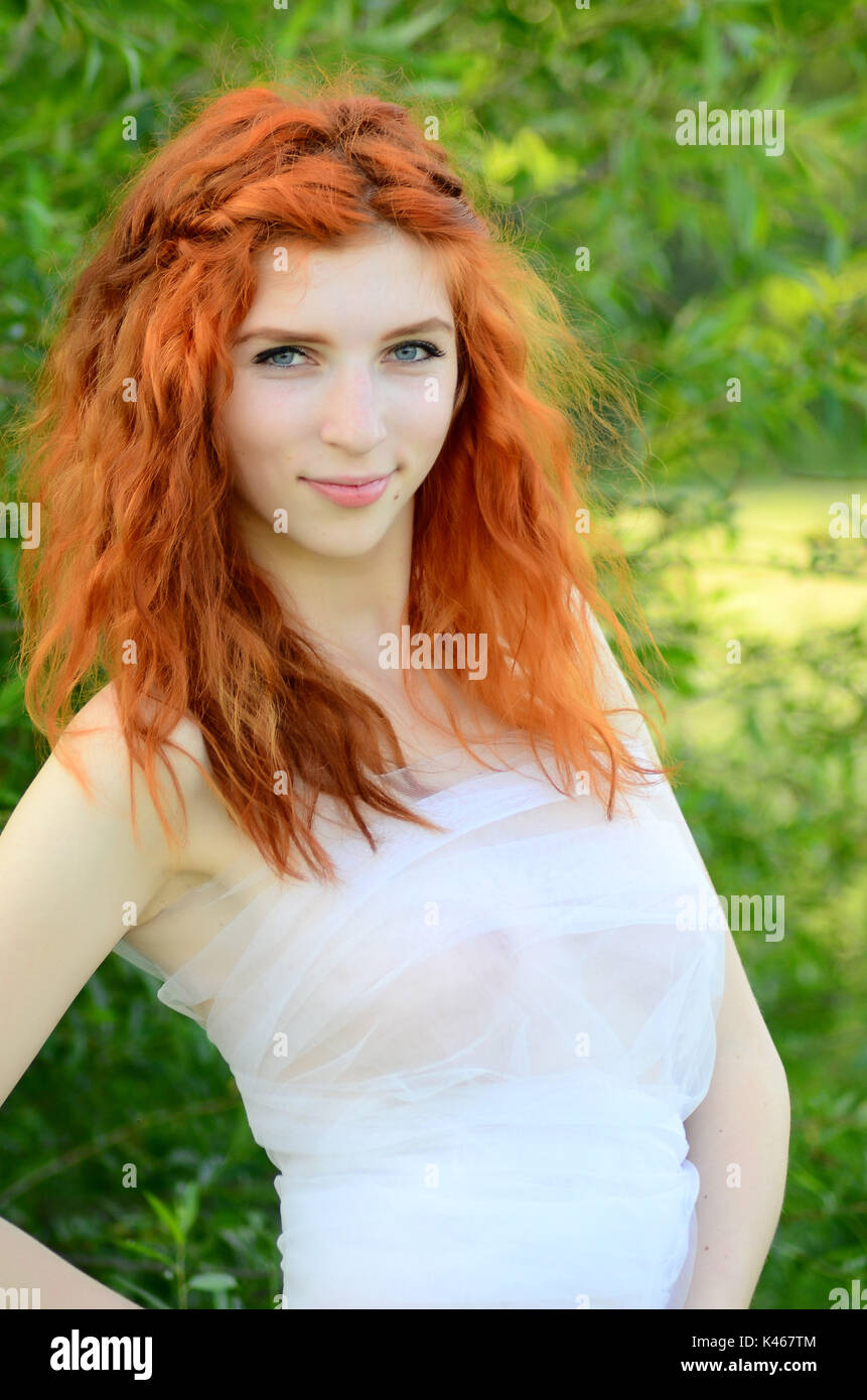A young beautiful ore girl of the Caucasian appearance is having fun ...