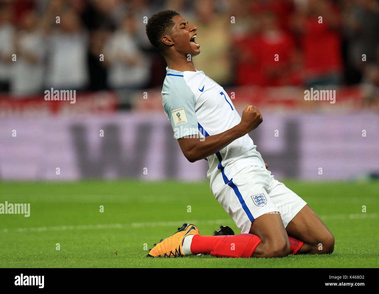 England's Marcus Rashford celebrates scoring his side's second goal ...
