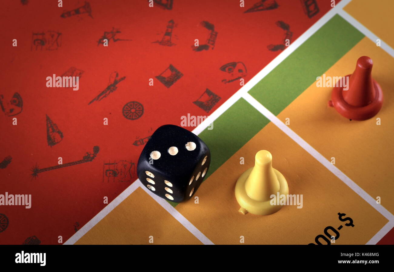 Colorful board game with dice Stock Photo - Alamy