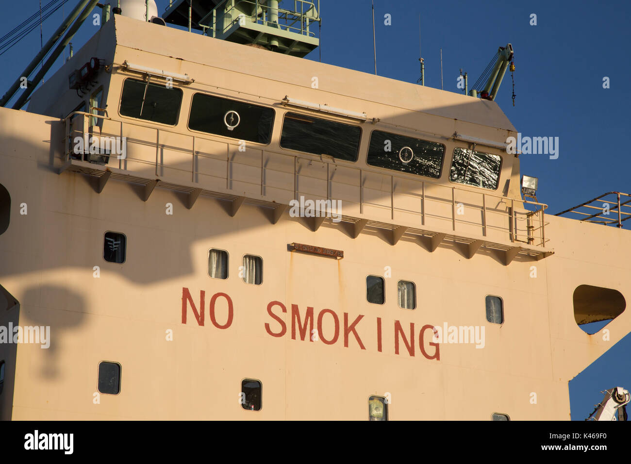 No smoking sign on bridge of container ship at Tarakan port, Kalimantan ...
