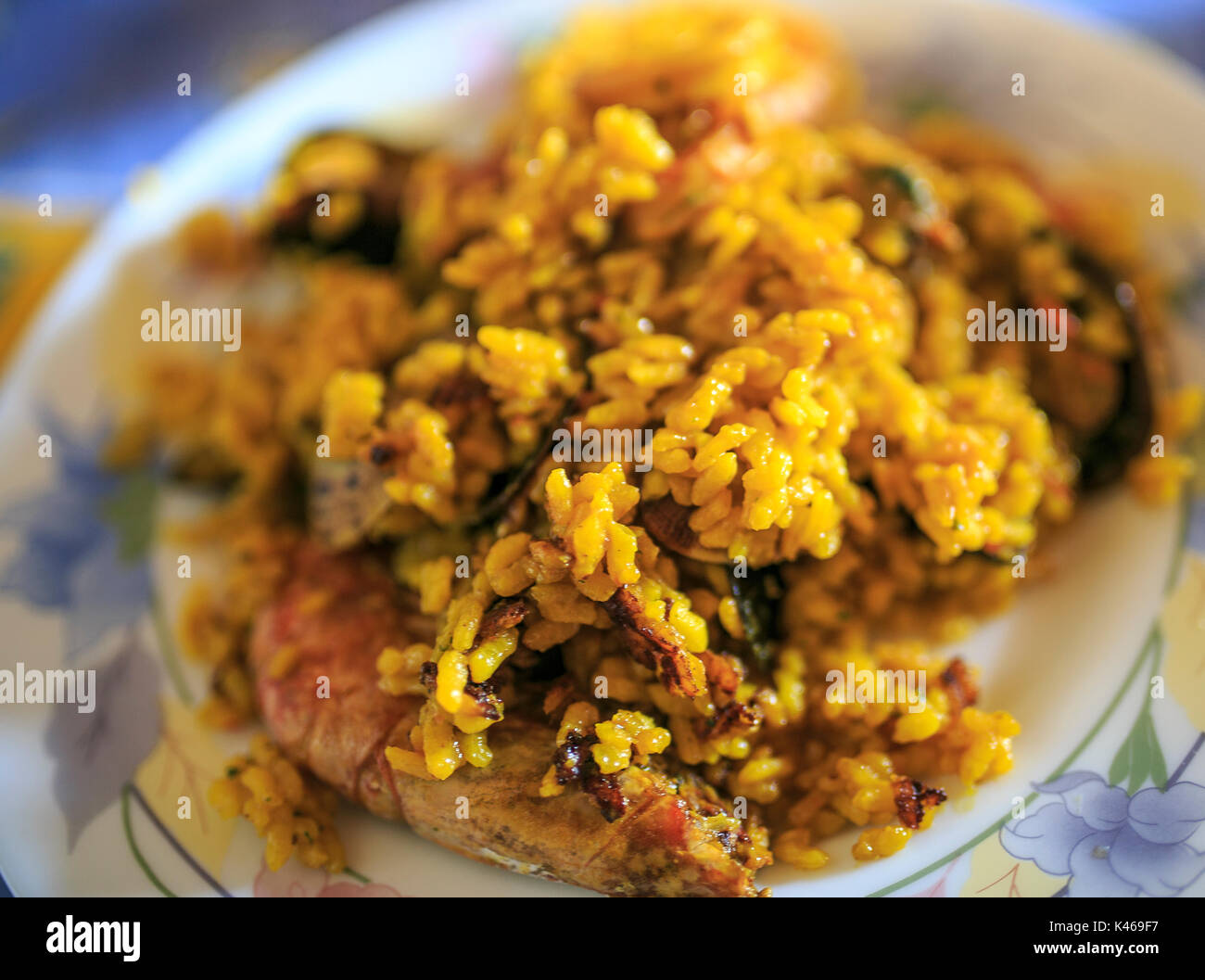 typical paella with seafood and rice Stock Photo - Alamy