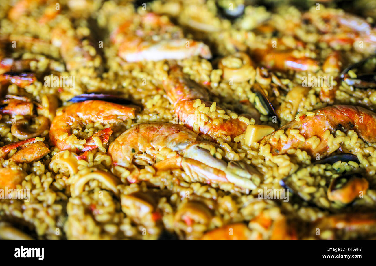 typical paella with seafood and rice Stock Photo - Alamy