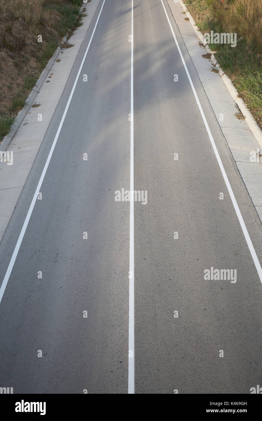 Isolated road in spain Stock Photo - Alamy