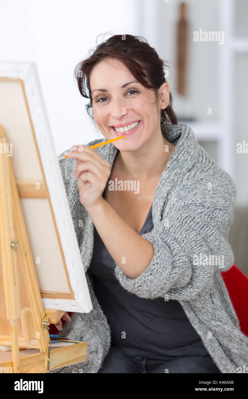 Smiling female artists painting hi-res stock photography and images - Alamy