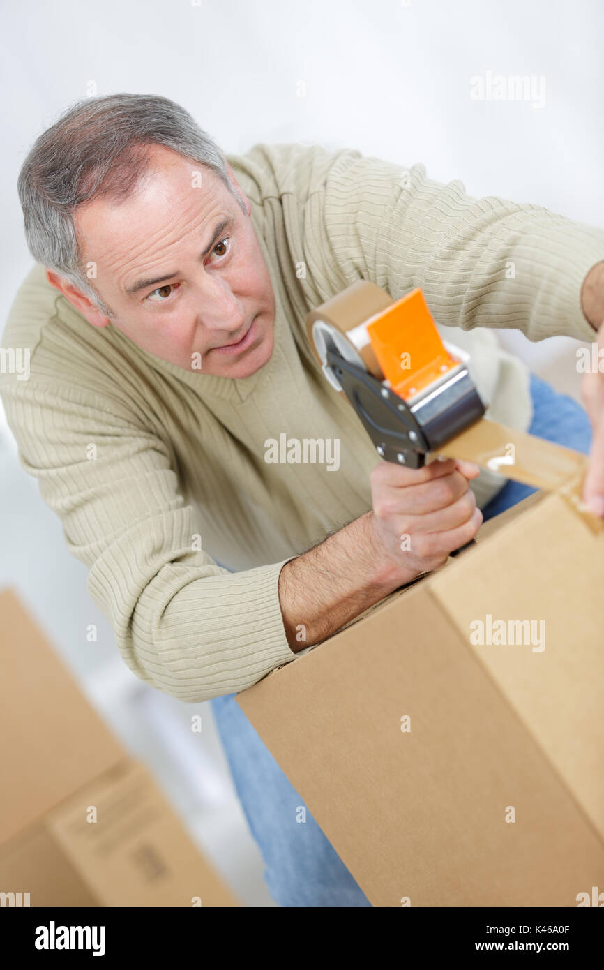 securing and taping the box Stock Photo - Alamy