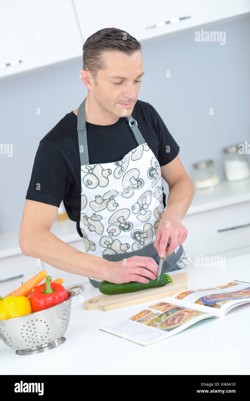 Male following recipe hi-res stock photography and images - Alamy