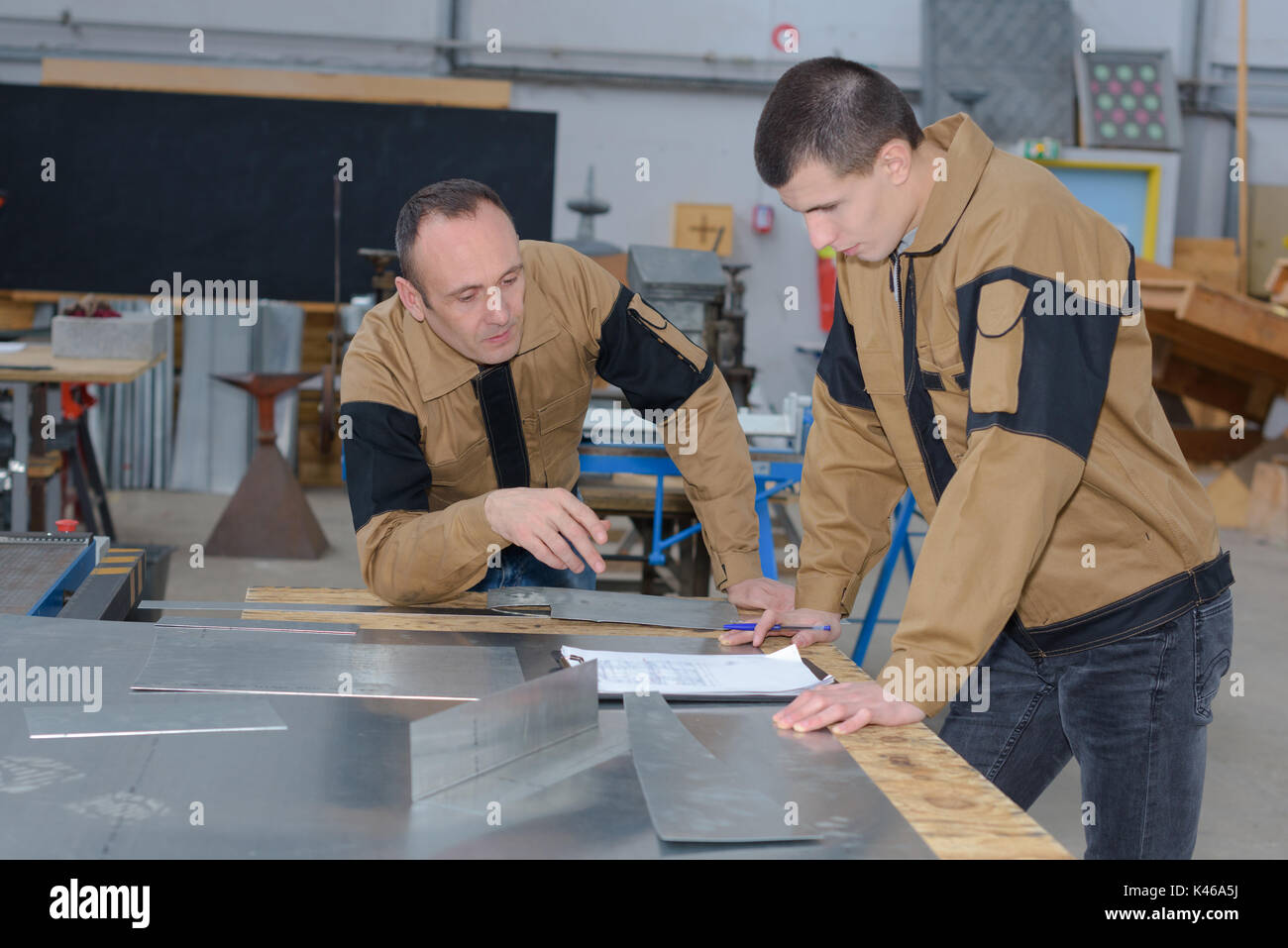 workers in a warehouse Stock Photo - Alamy