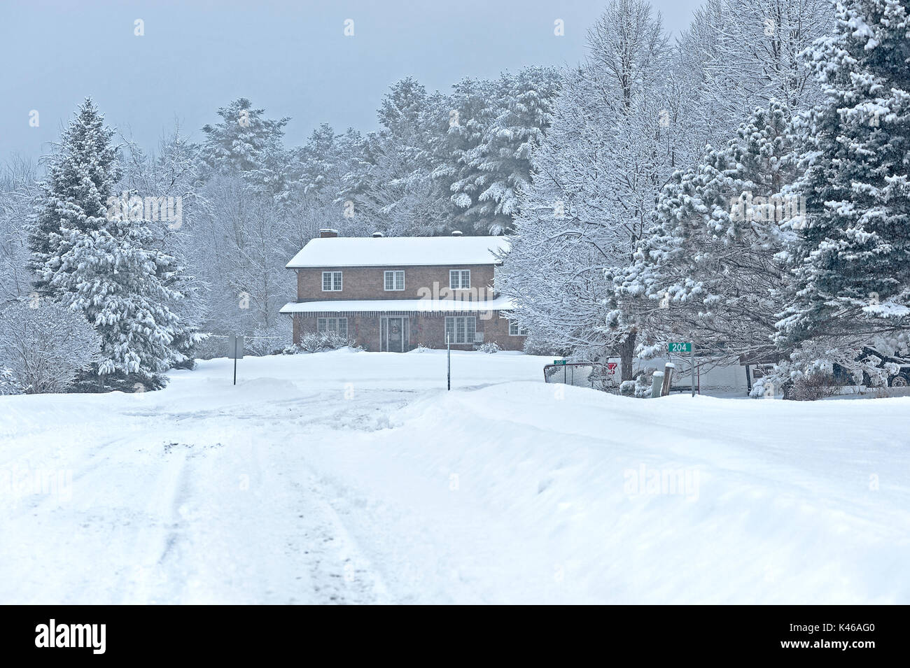 House and street in snow storm Stock Photo - Alamy