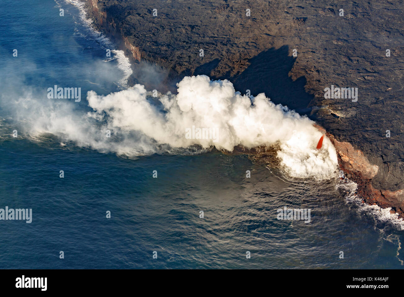 Aerial overview of area affected by fire hose waterfall shaped spill of ...