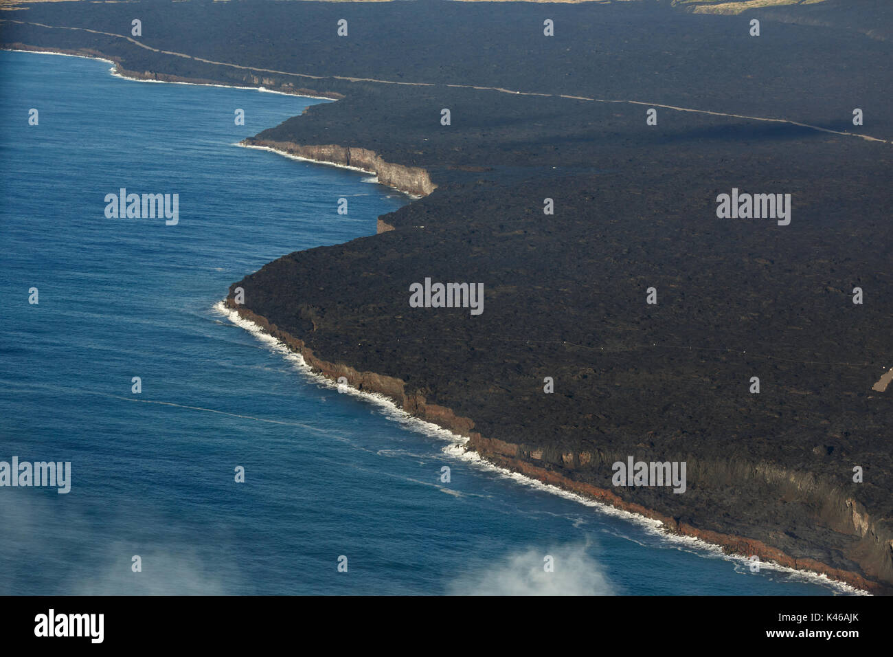 Aerial view of road covered by lava in Volcanos National Park Stock ...
