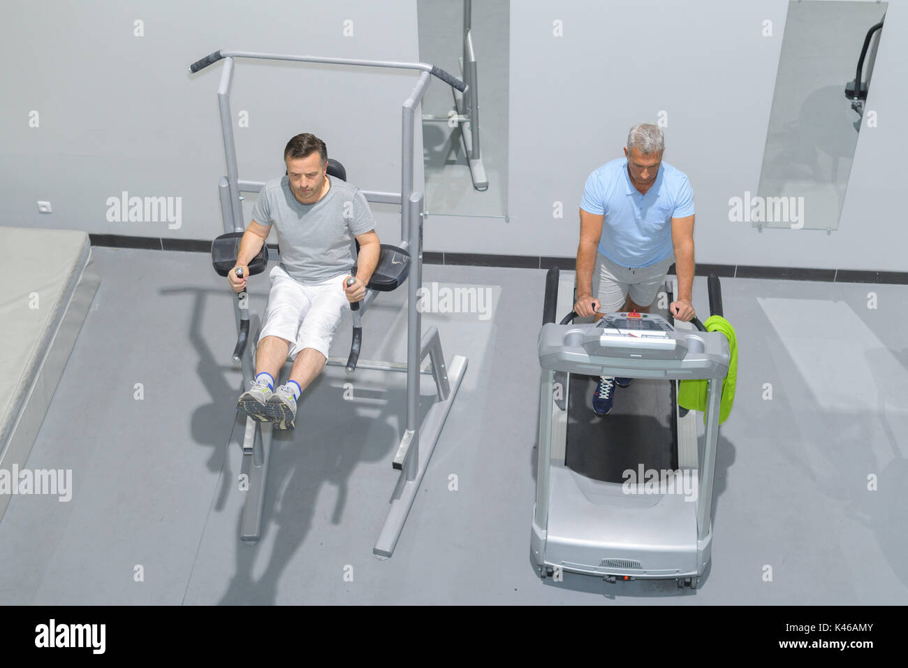 Two men exercising in gymnasium hi-res stock photography and images - Alamy