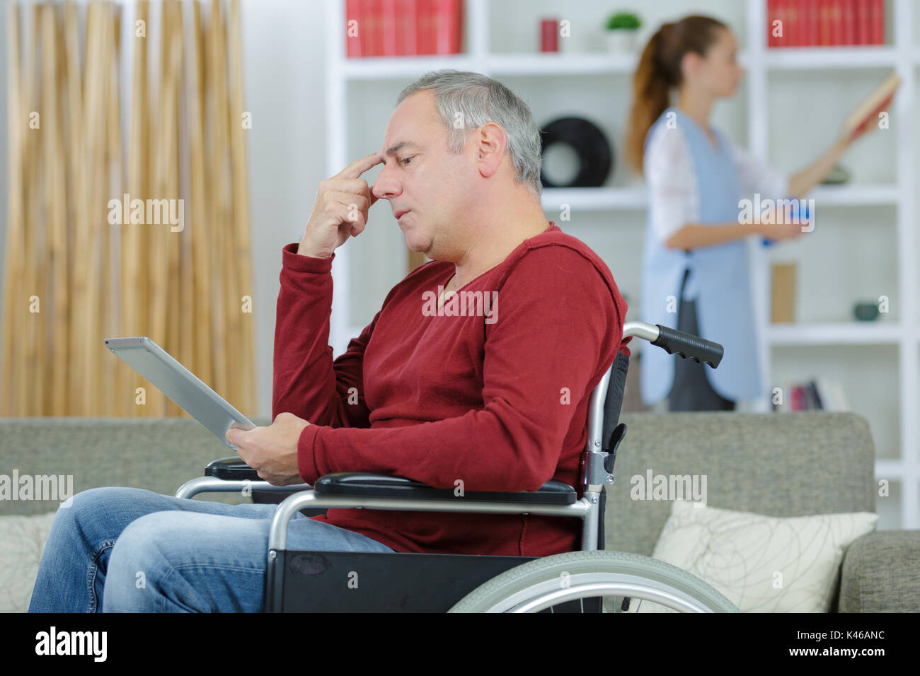 vertical view of senior man reading book Stock Photo - Alamy