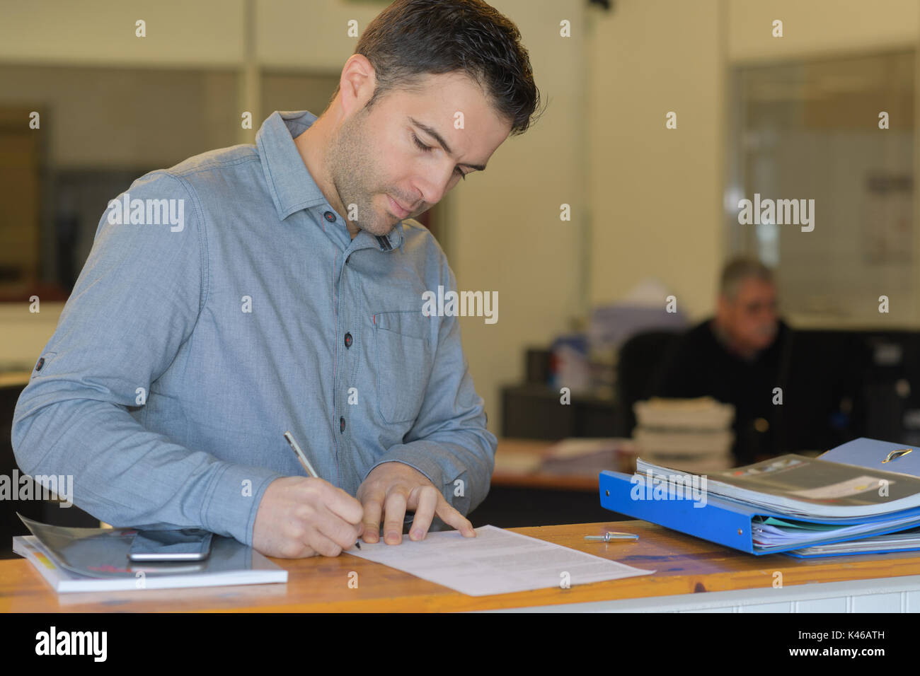 Elderly client documents hi-res stock photography and images - Alamy