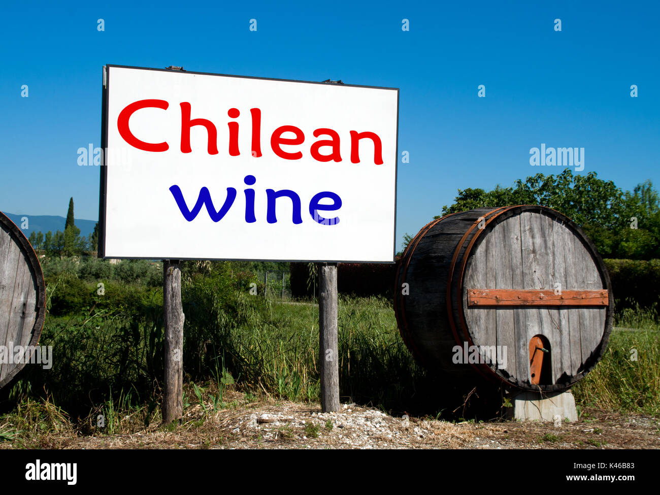 Traditional wooden barrel with a billboard that advertises the sale of ...