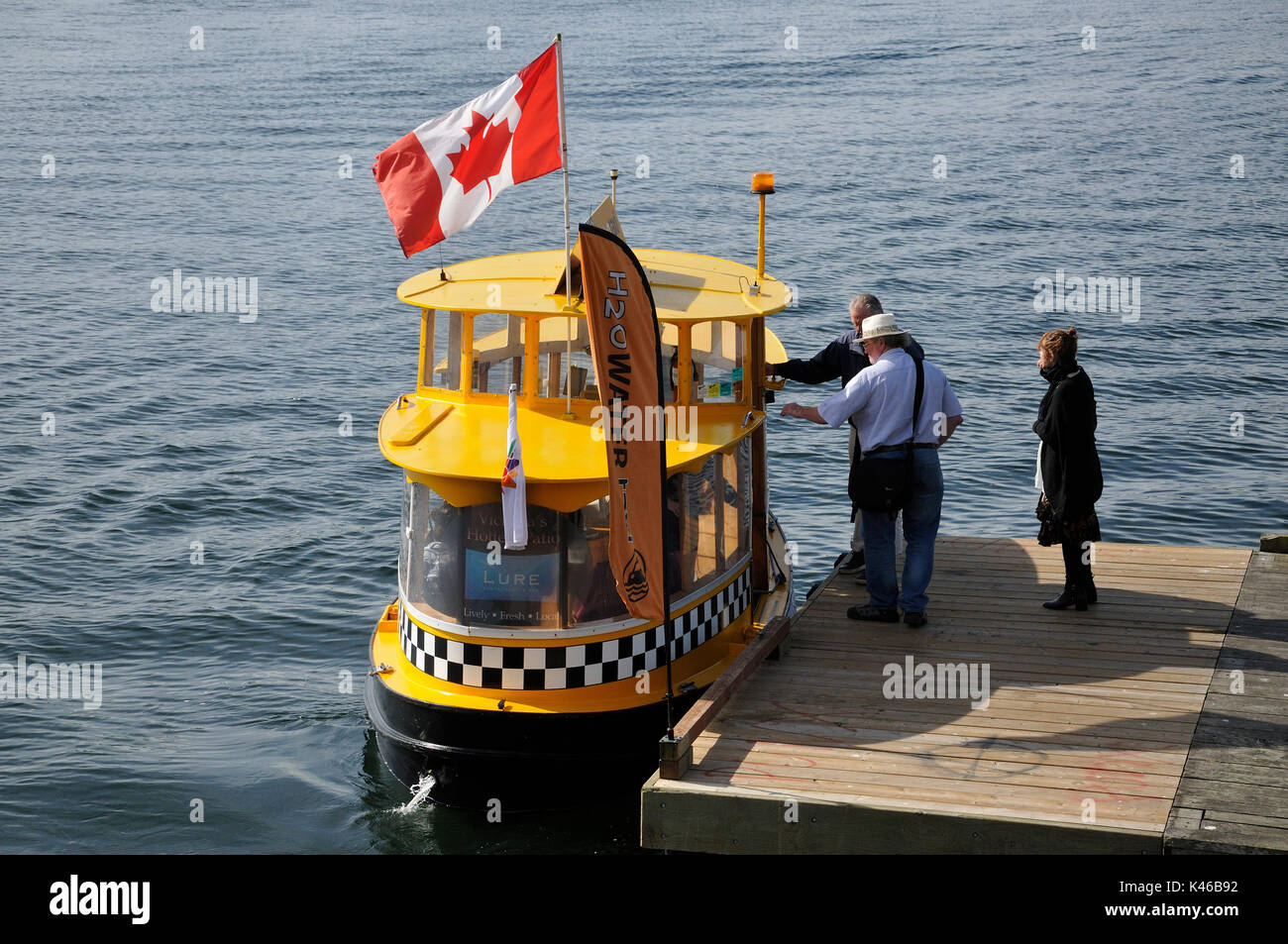 People boarding water taxi hi-res stock photography and images - Alamy
