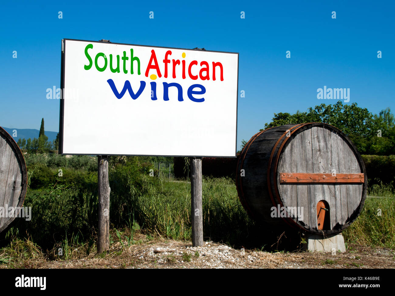 Traditional wooden barrel with a billboard that advertises the sale of ...