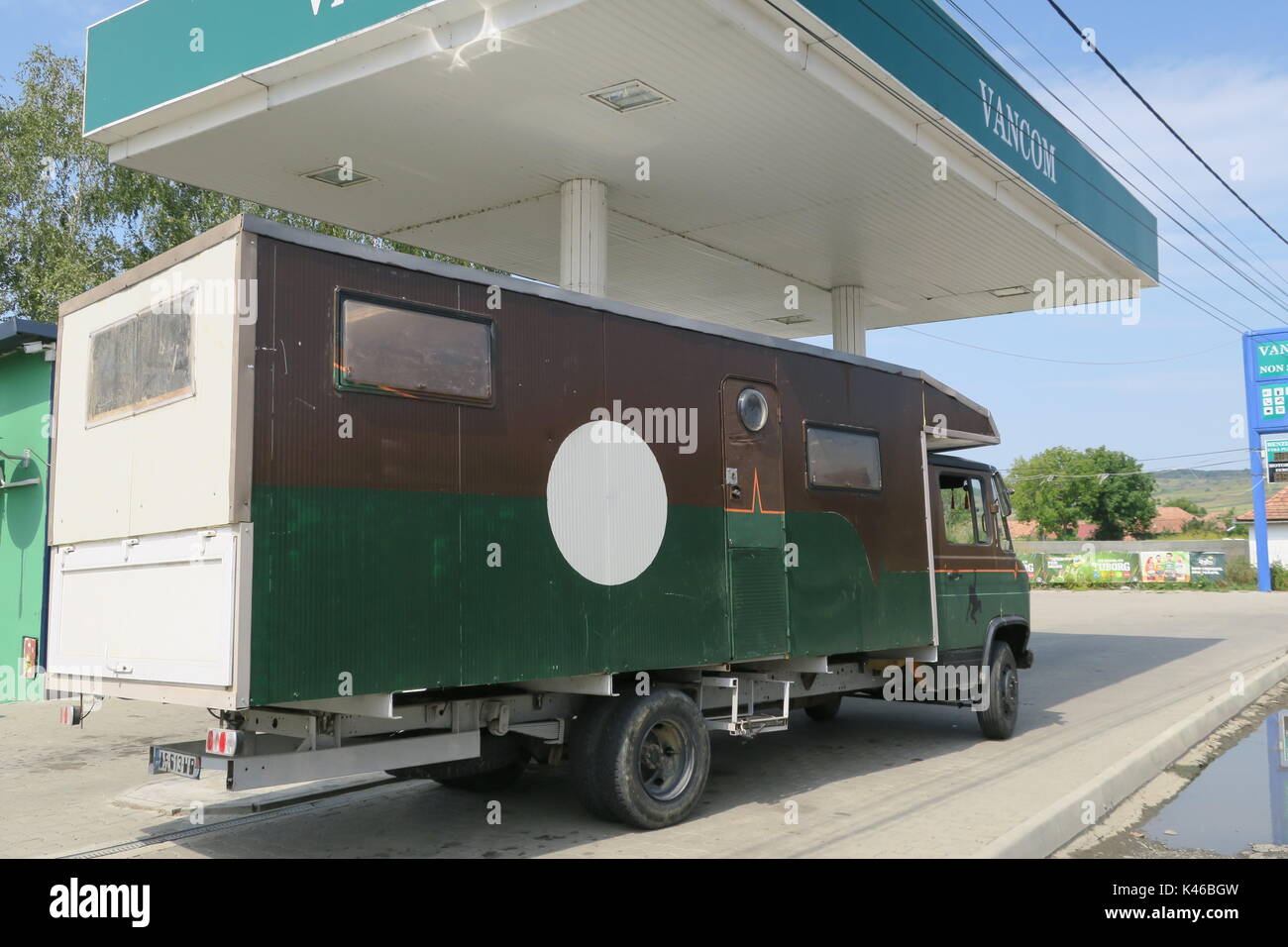 Antique van on a petrol station, Romania Stock Photo - Alamy