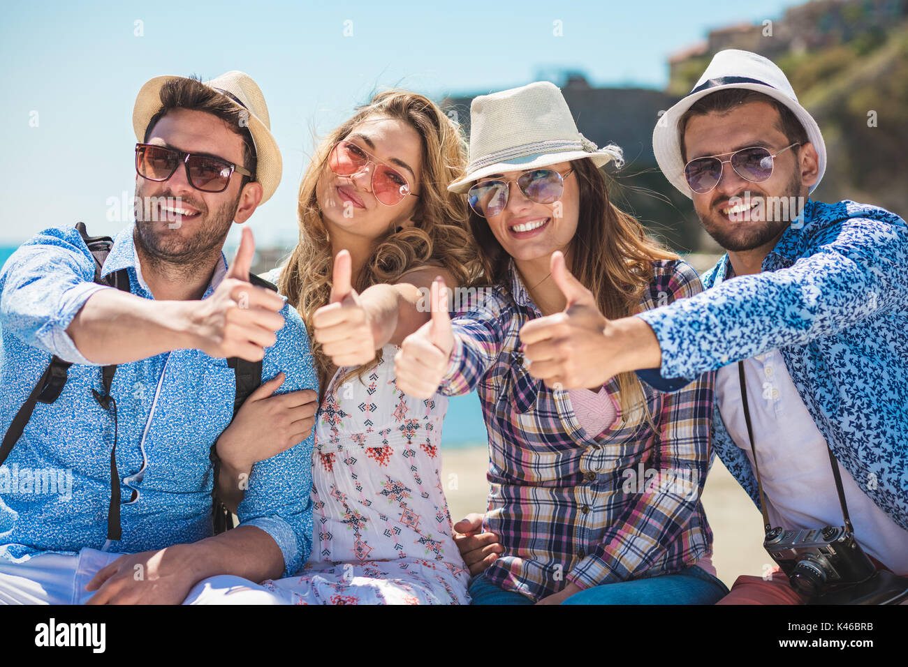 Group of friends taking funny portraits outdoor Stock Photo - Alamy