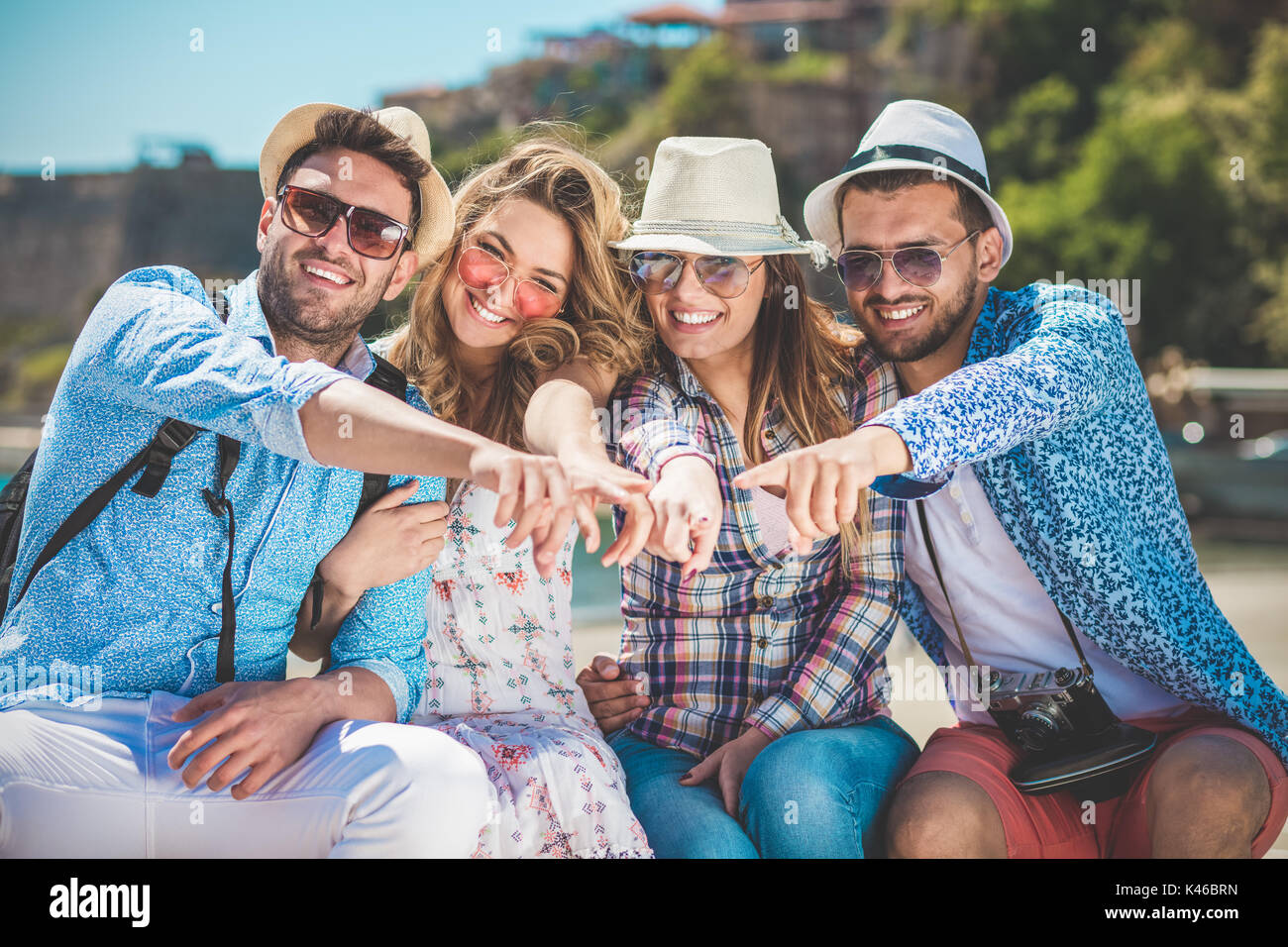 Group of friends taking funny portraits outdoor Stock Photo - Alamy