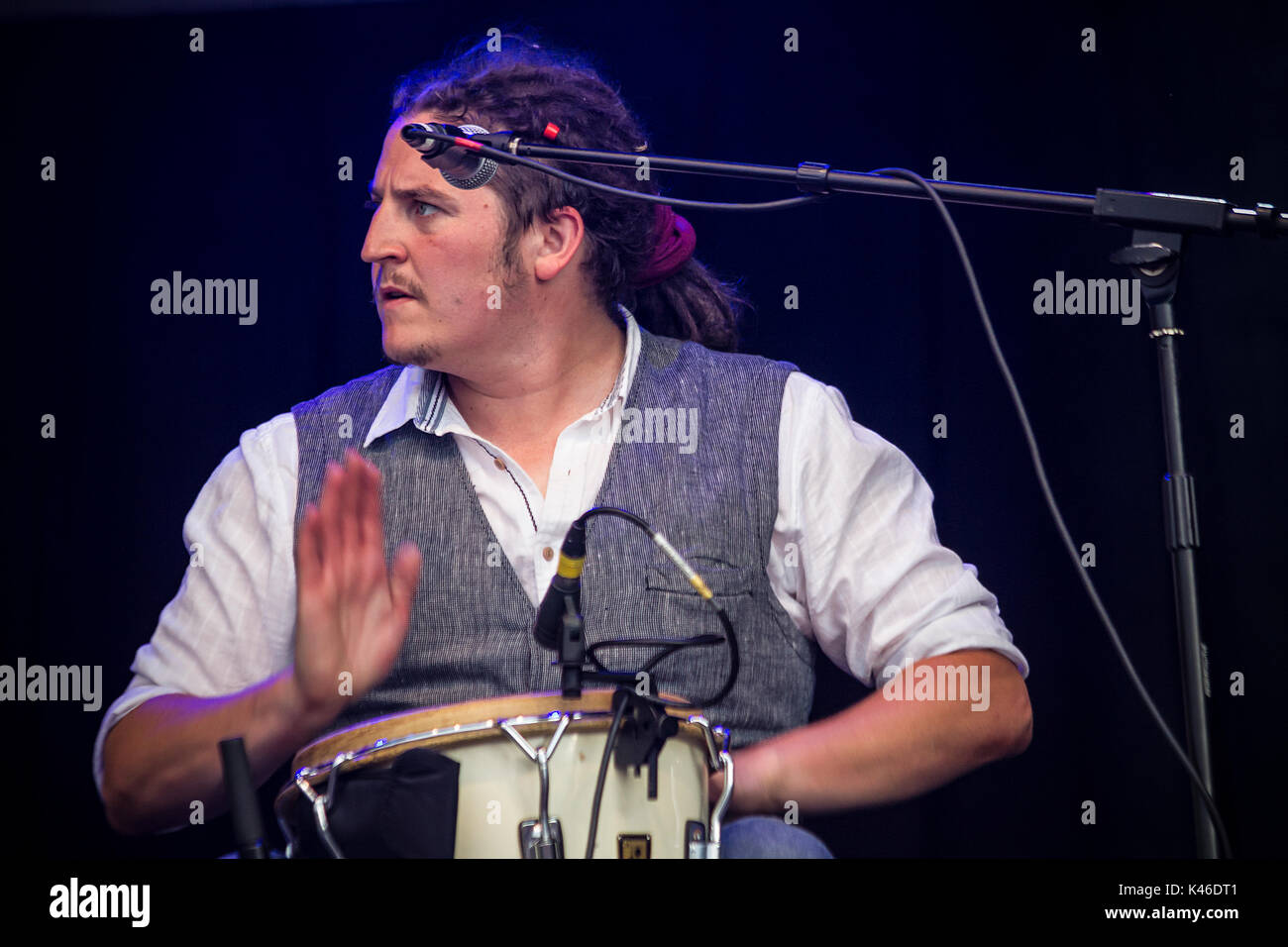 British singer and percussionist Ali McMillan performing with Matt ...