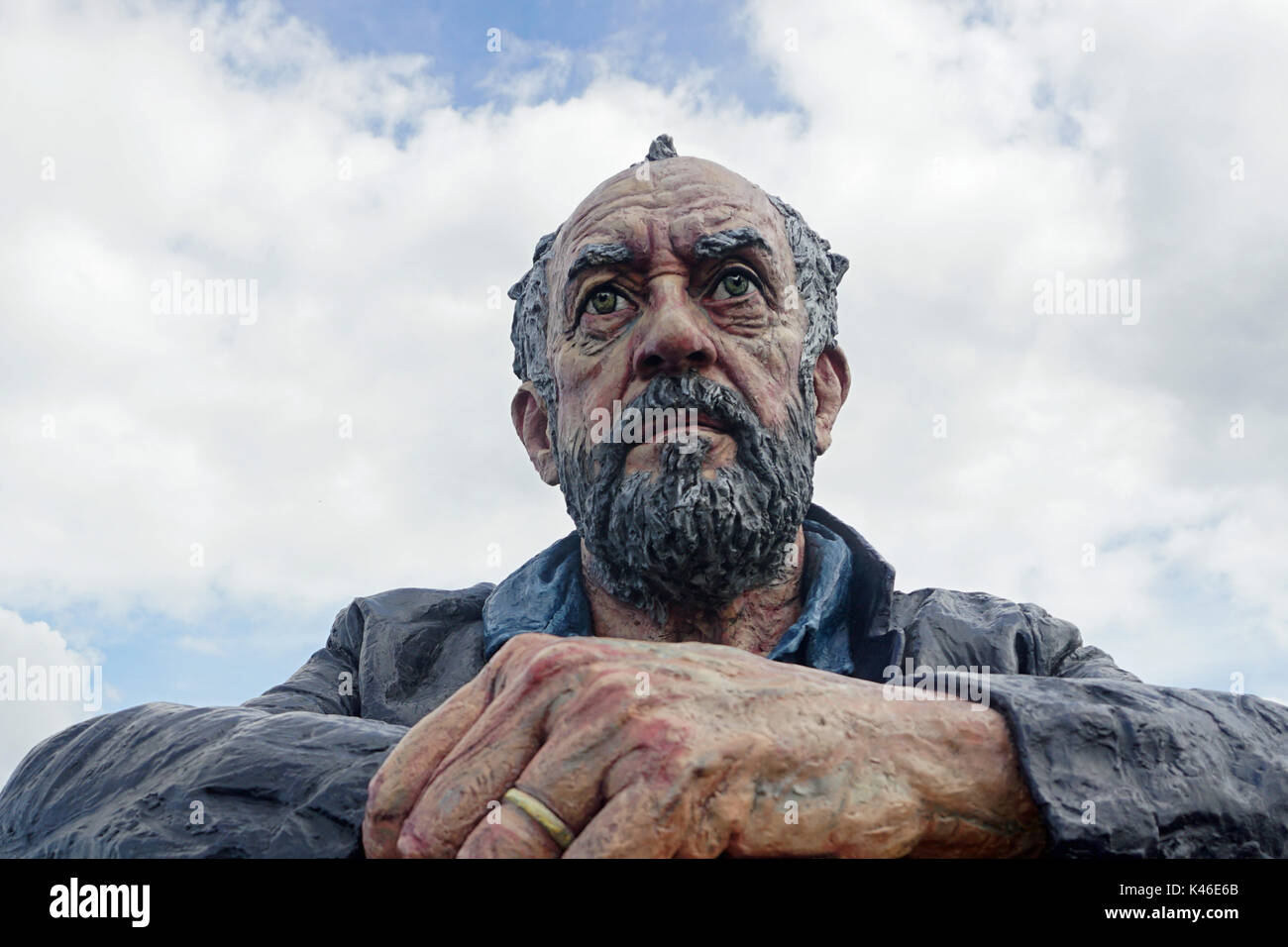 Seated man statue hi-res stock photography and images - Alamy