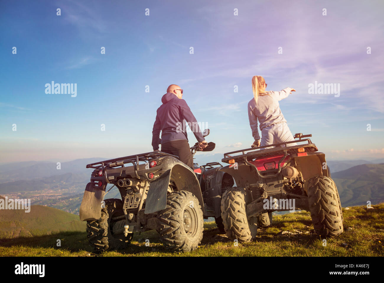 Young couple riding atv quad hi-res stock photography and images - Alamy