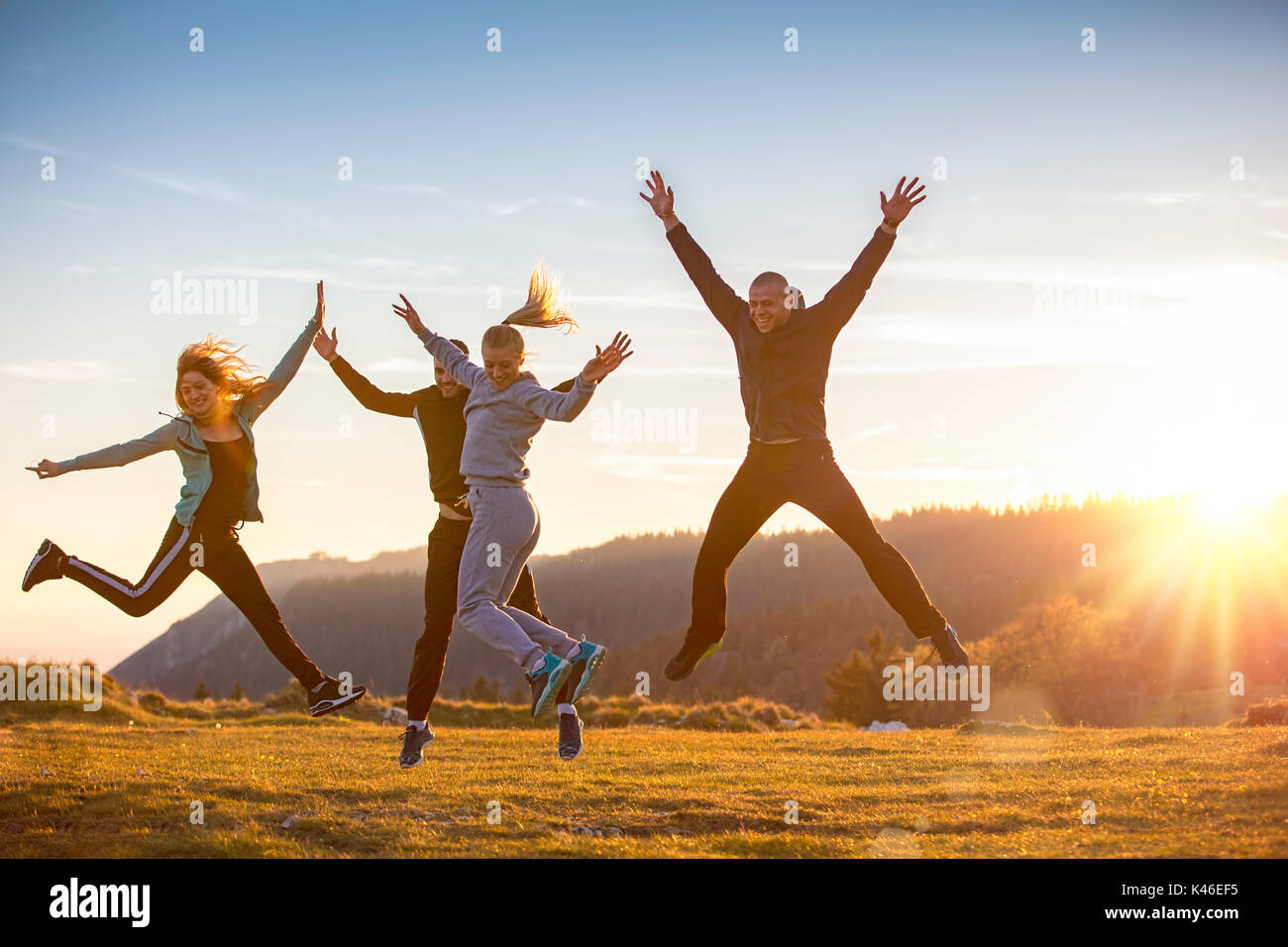 Kid jumping happily hi-res stock photography and images - Alamy