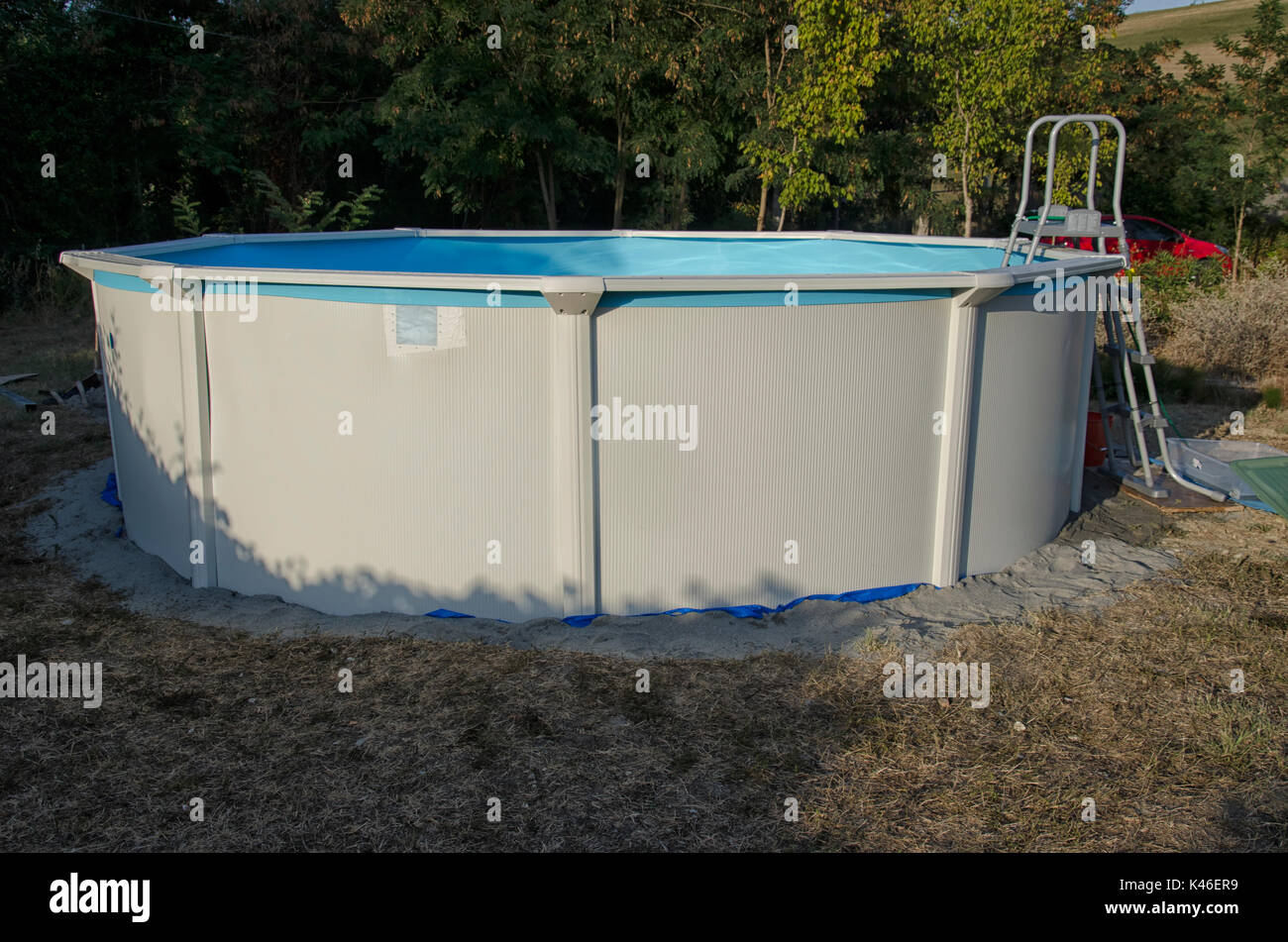 View of a metal steel frame swimming pool Stock Photo - Alamy