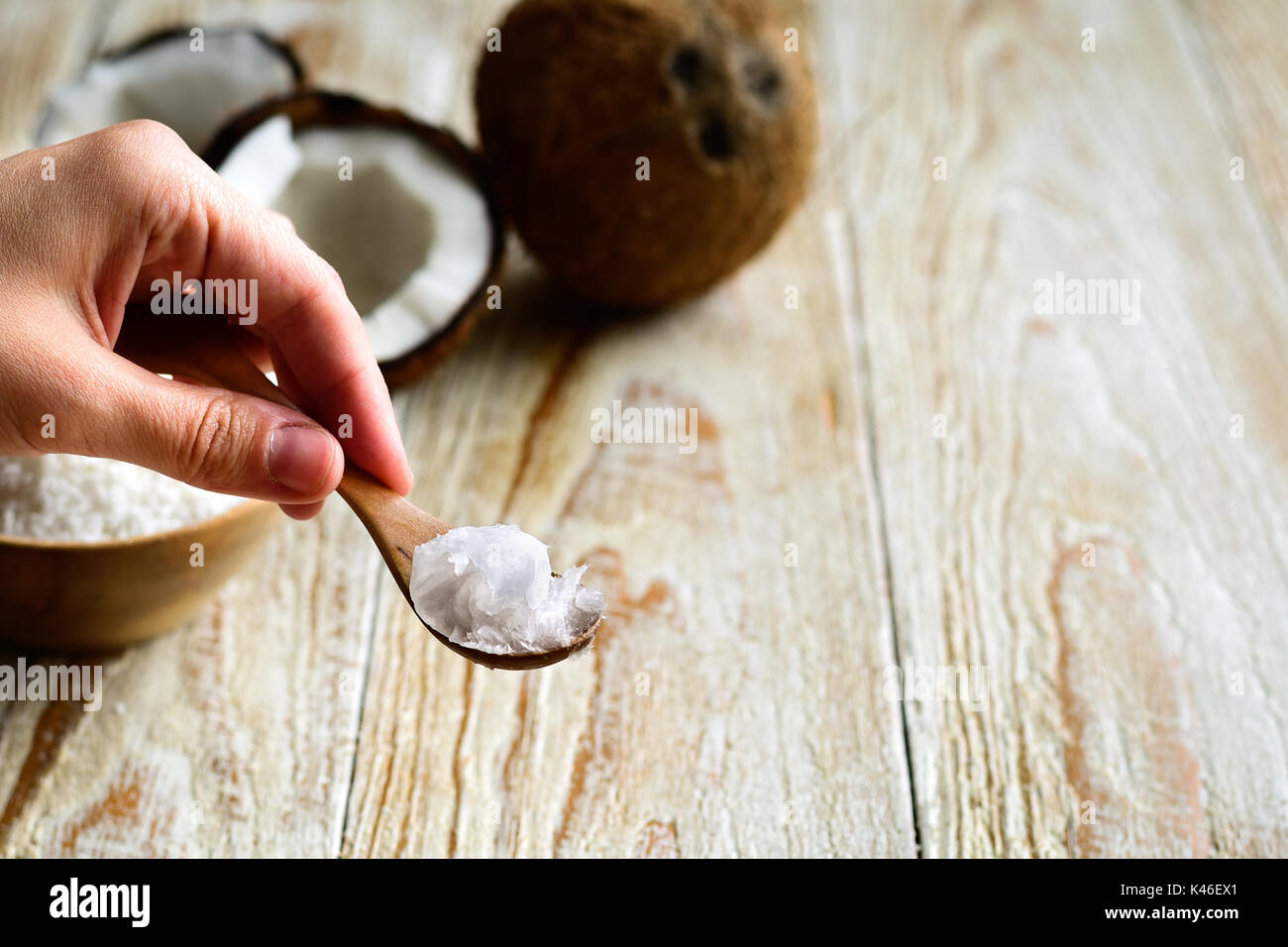 Hand holding spoon hi-res stock photography and images - Alamy