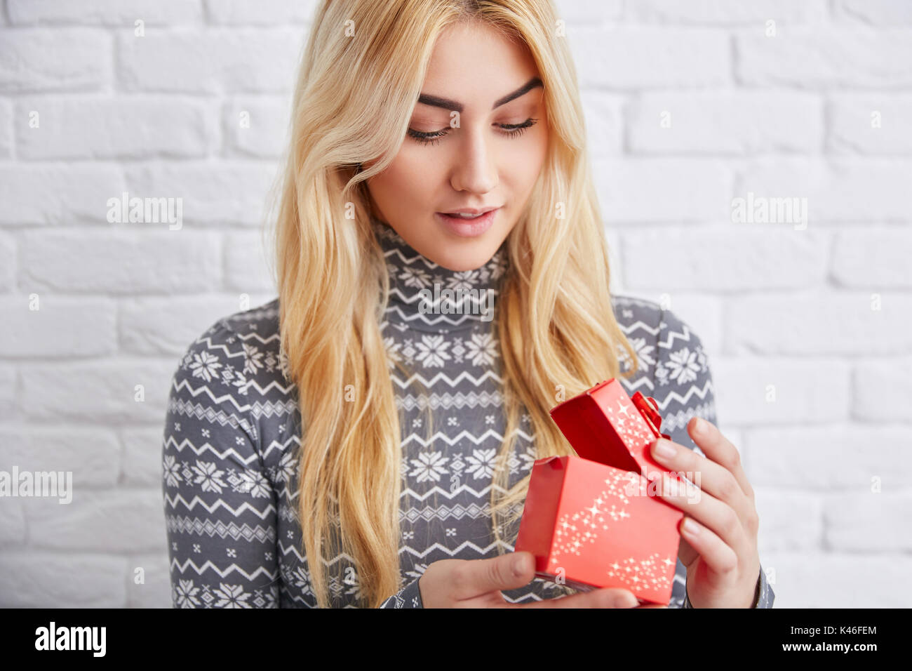 Beautiful young woman wondering inside hi-res stock photography and ...