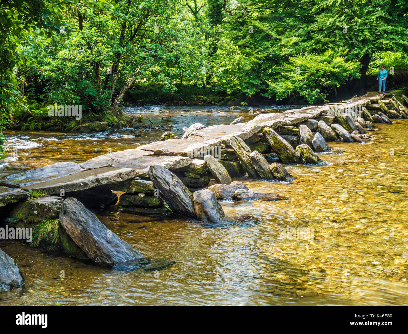 Woman girl walking bridge river hi-res stock photography and images - Alamy