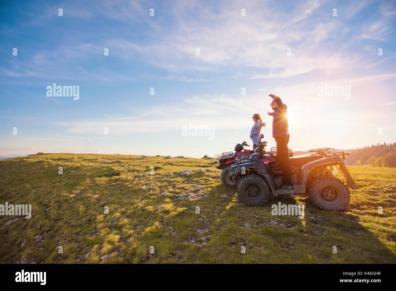Young couple riding atv quad hi-res stock photography and images - Alamy
